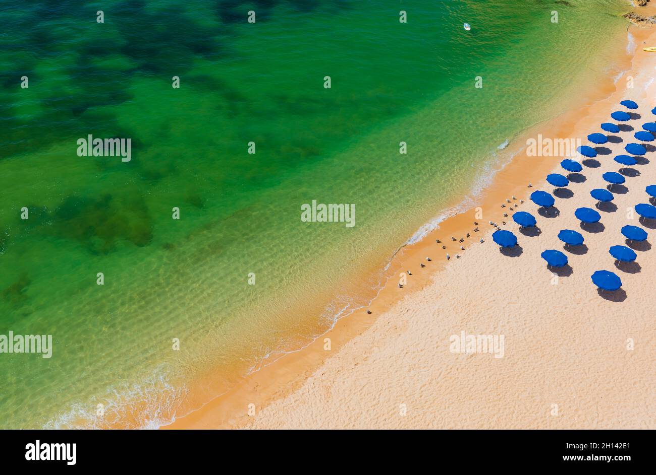 Aerial drone views of Praia da Marinha and Malhada do Baraco - beaches ...