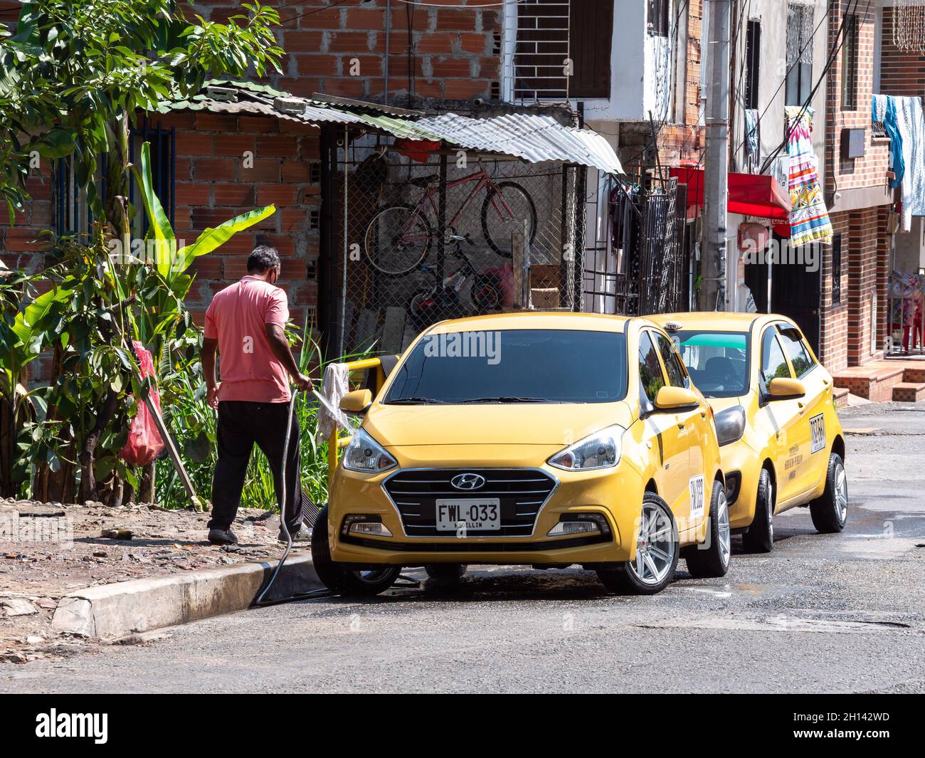 Taxi man cleaning hi-res stock photography and images - Alamy