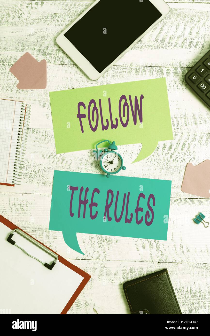 Sign displaying Follow The Rules. Internet Concept go with regulations ...