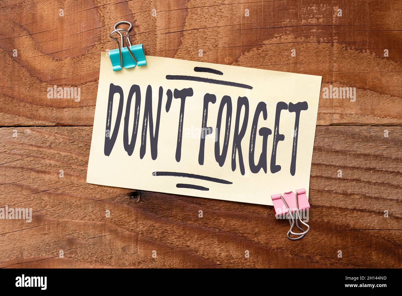 Hand writing sign Don T Forget. Concept meaning used to remind someone ...