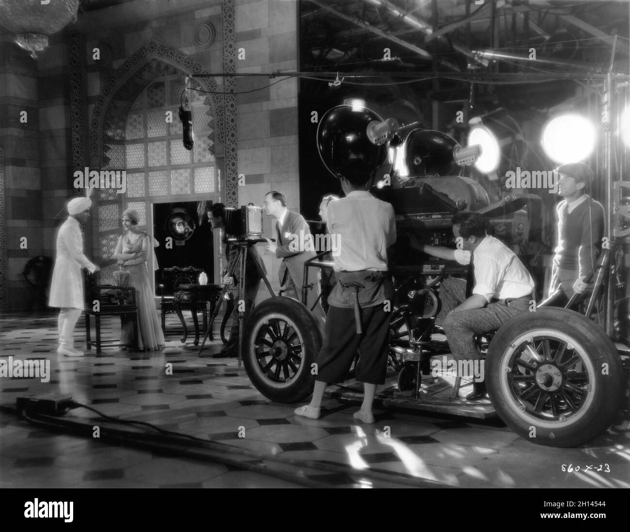 RAMON NOVARRO and MADGE EVANS on set candid with Unidentified Still ...