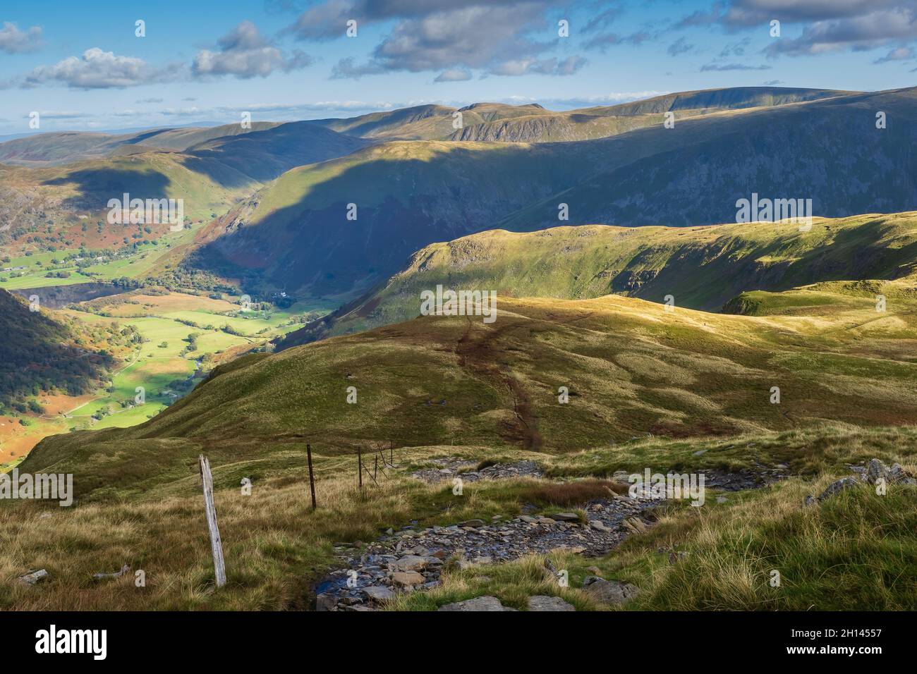 Walking High Pike, a fell in the English Lake District, located five ...