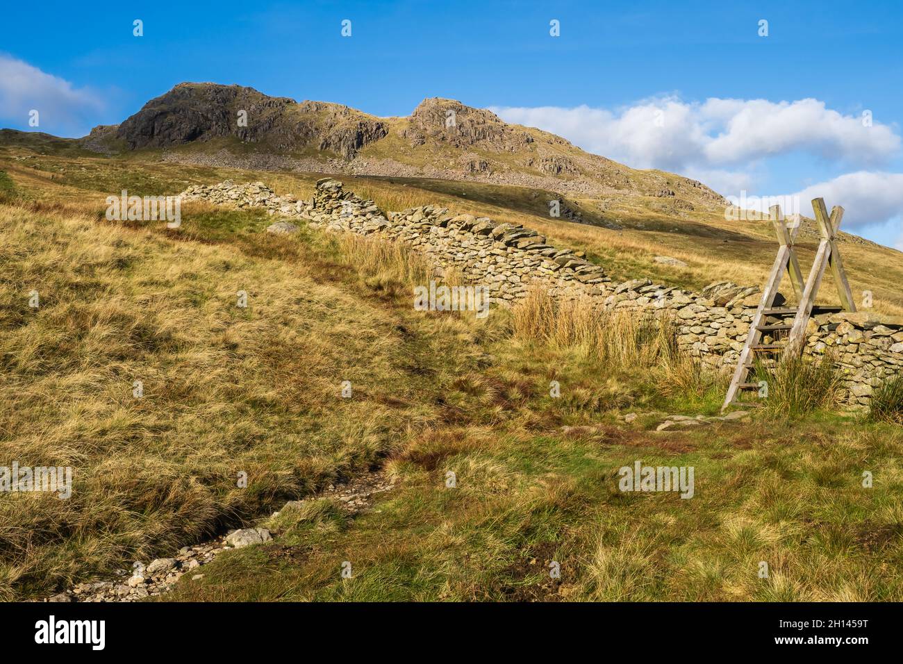 Walking High Pike, a fell in the English Lake District, located five ...