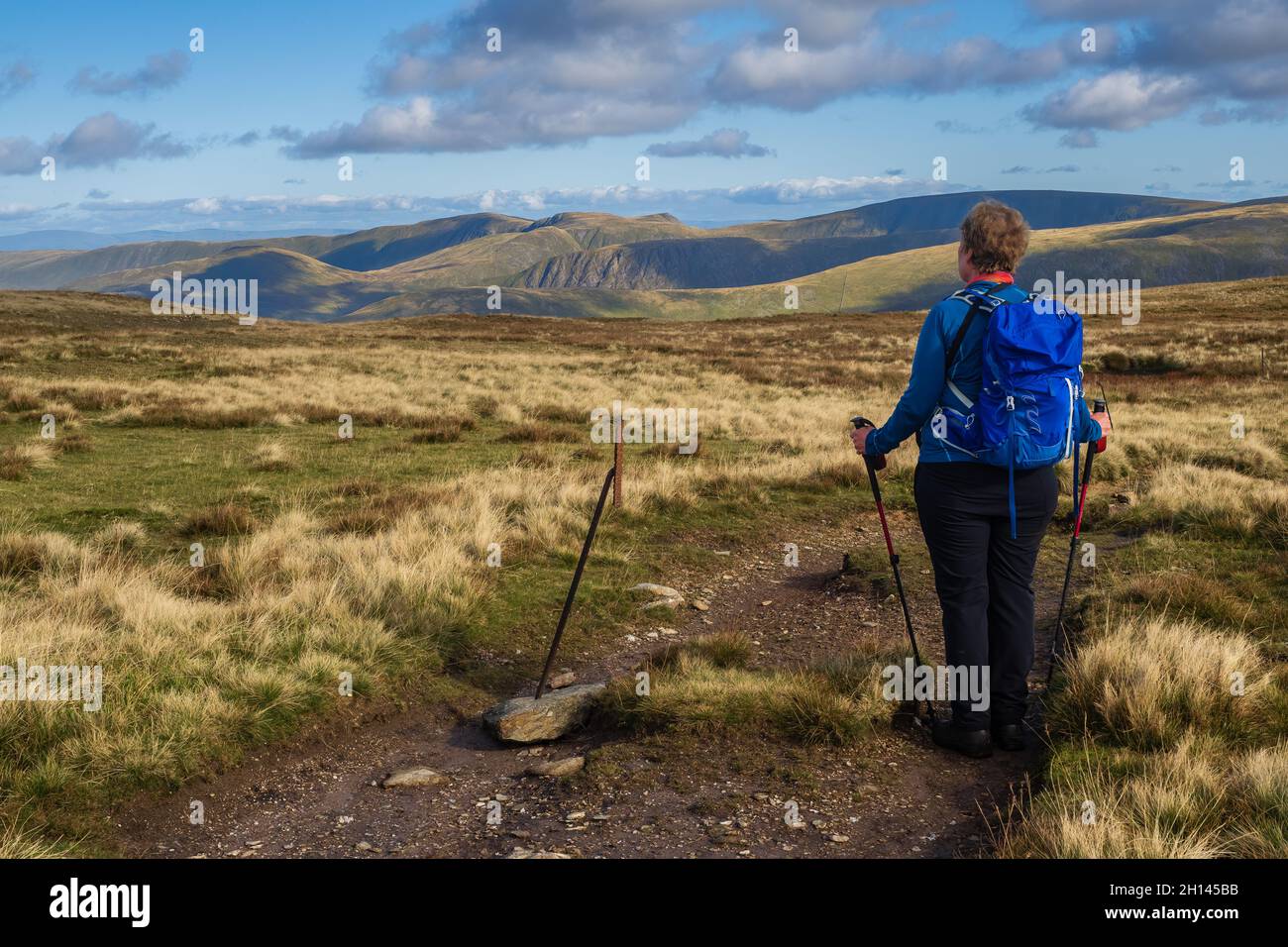 Walking High Pike, a fell in the English Lake District, located five ...