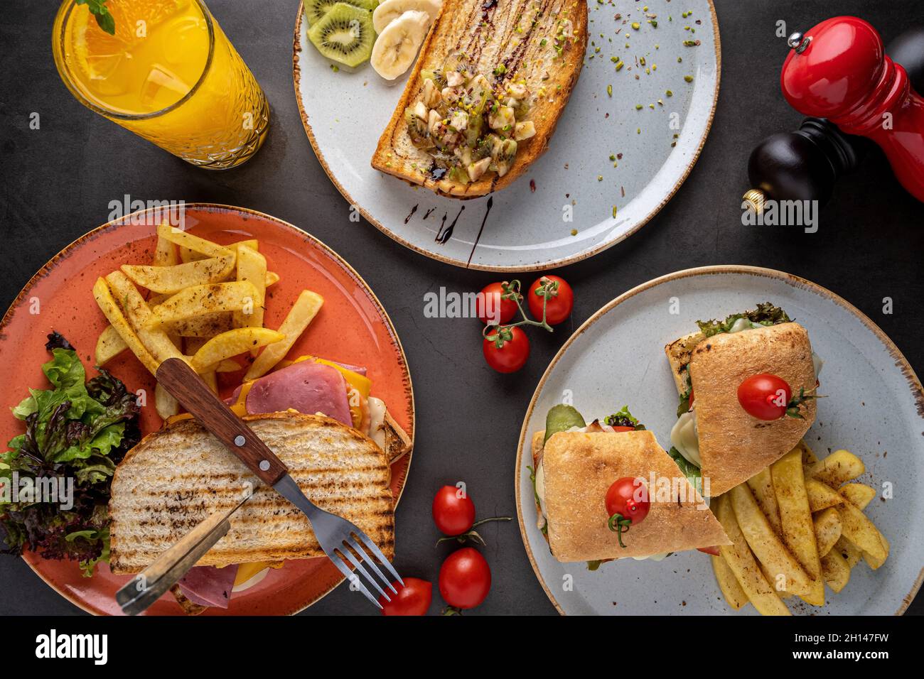 Various types of toast and sandwiches on stone table Stock Photo - Alamy