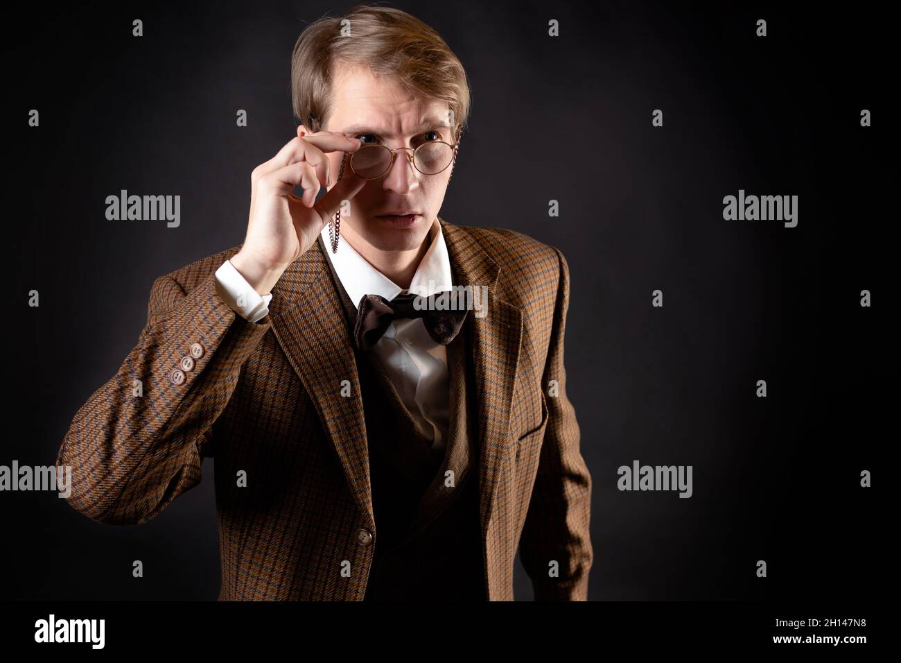 An intelligent gentleman in the Victorian style. Vintage retro suit ...