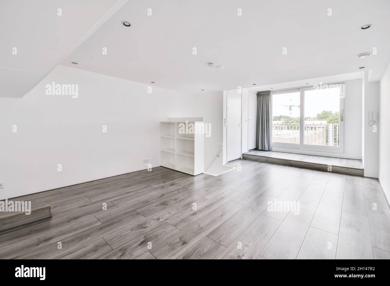 Interior of a white room with windows Stock Photo - Alamy