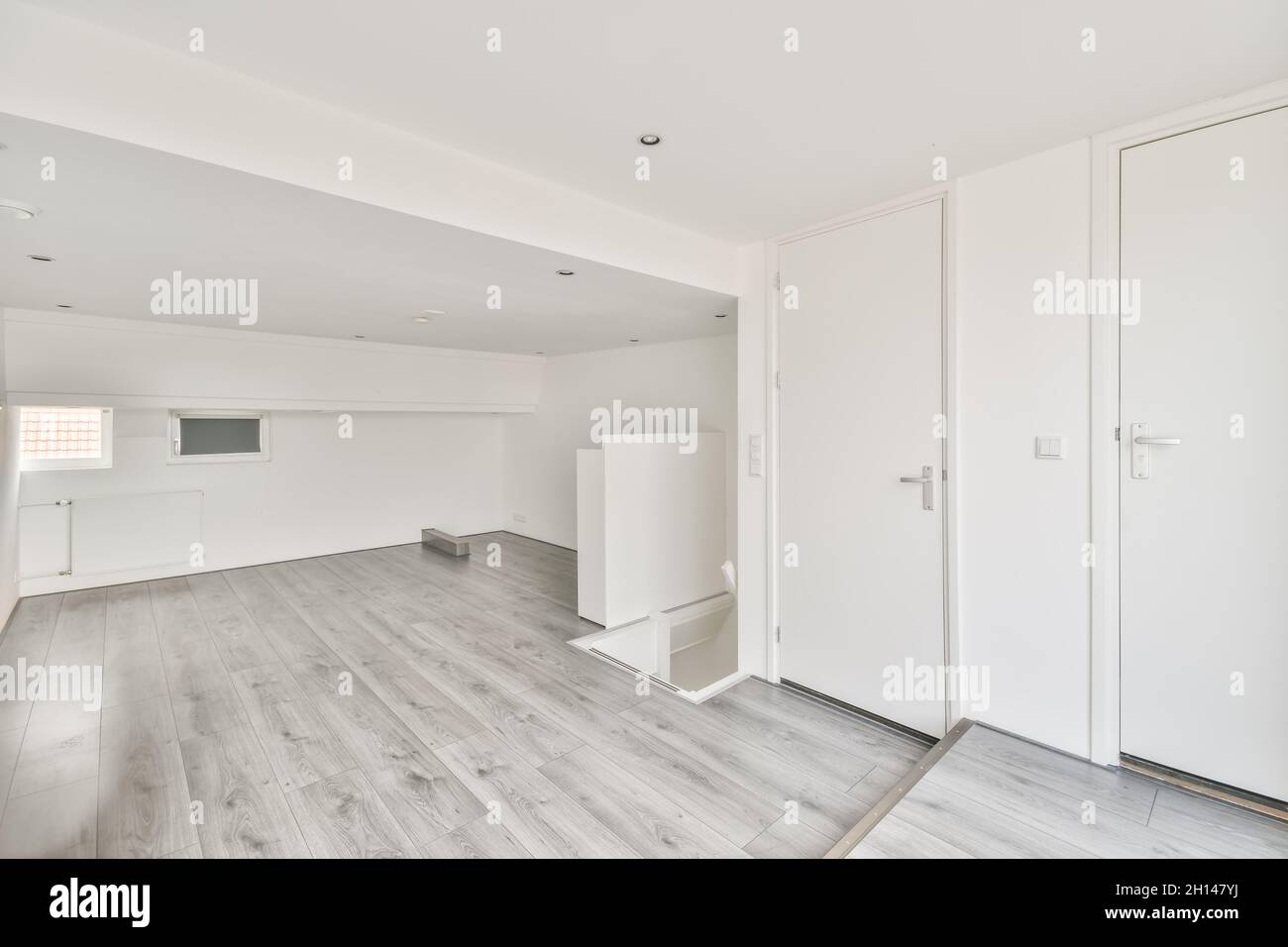 Interior of an empty room with white walls Stock Photo - Alamy