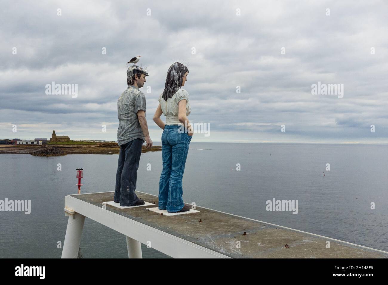 The Couple - a statue in Newbiggin, Northumberland Stock Photo - Alamy