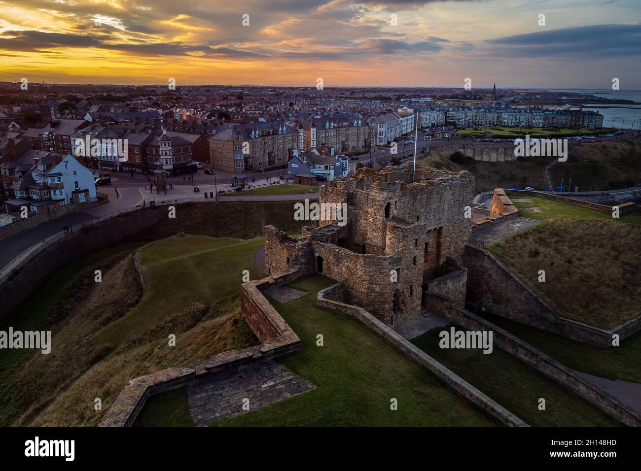 Aerial view of Tyneside priory & castle at sunset Stock Photo - Alamy