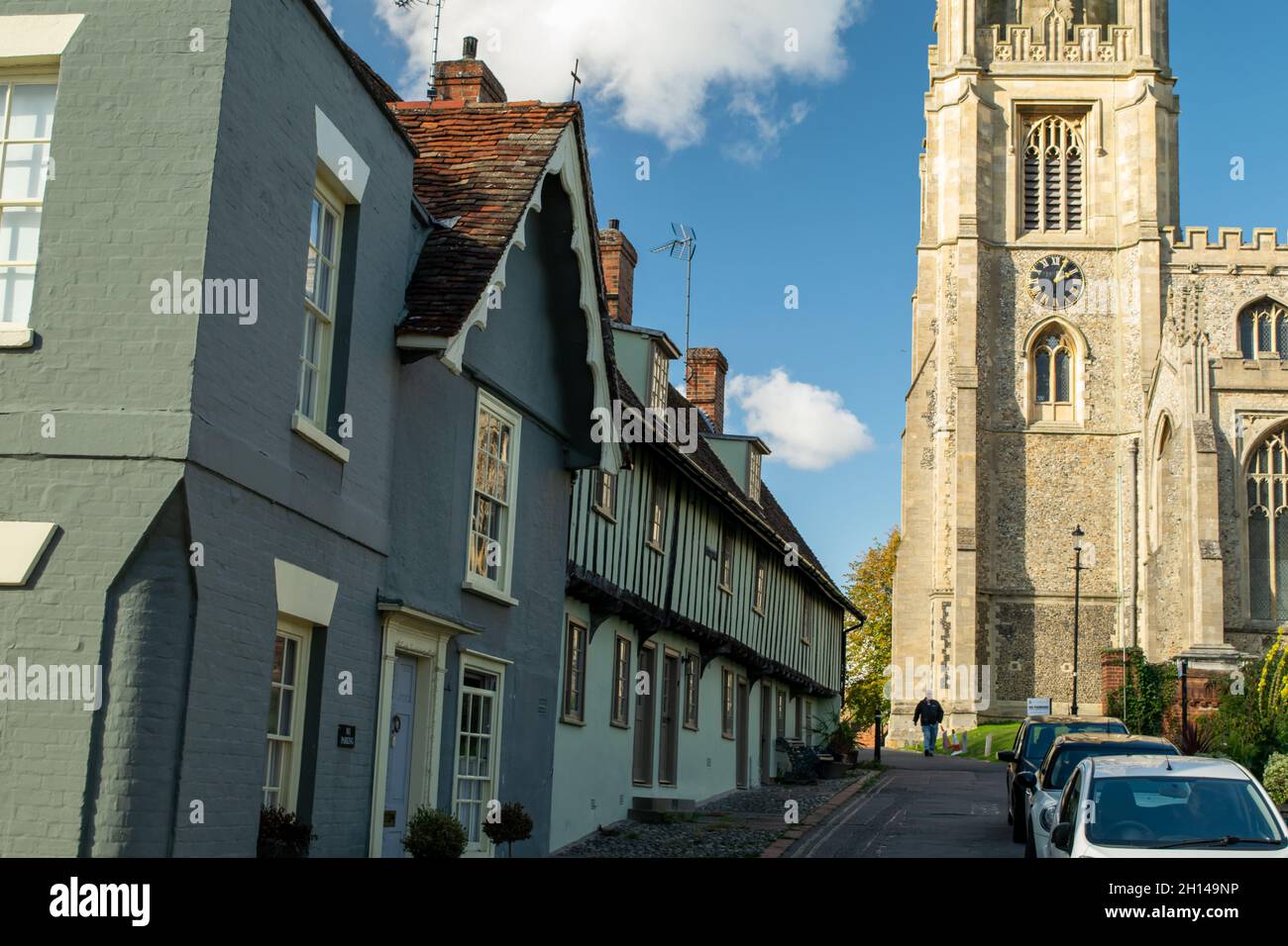 Facade of old traditional terraced cottage brick houses in front of a ...