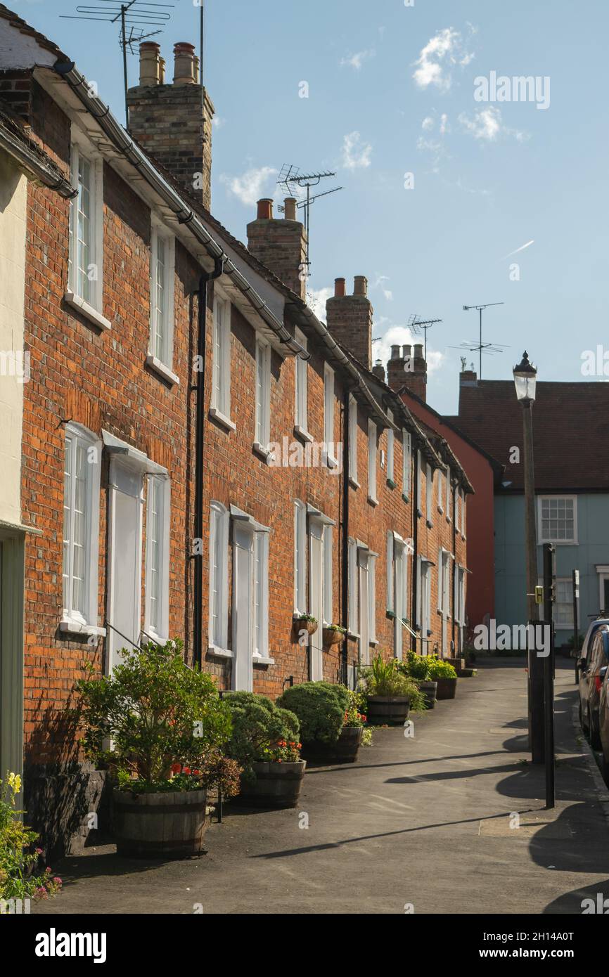 Facade of British terraced brick houses at Saffron Walden, England ...
