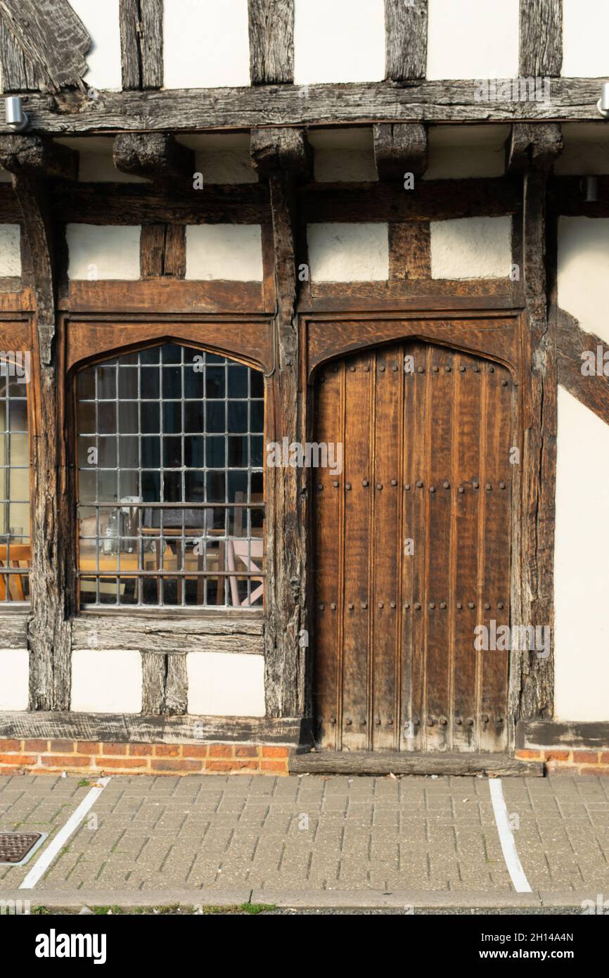 Medieval arched wooden gate at Tudor timber framed pub at Saffron ...