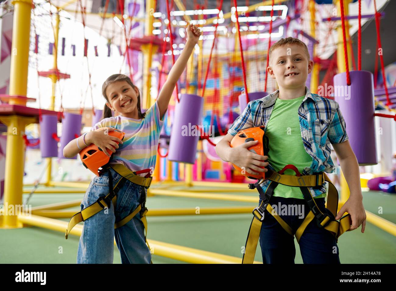 Two children poses in climbing area, young climber Stock Photo - Alamy