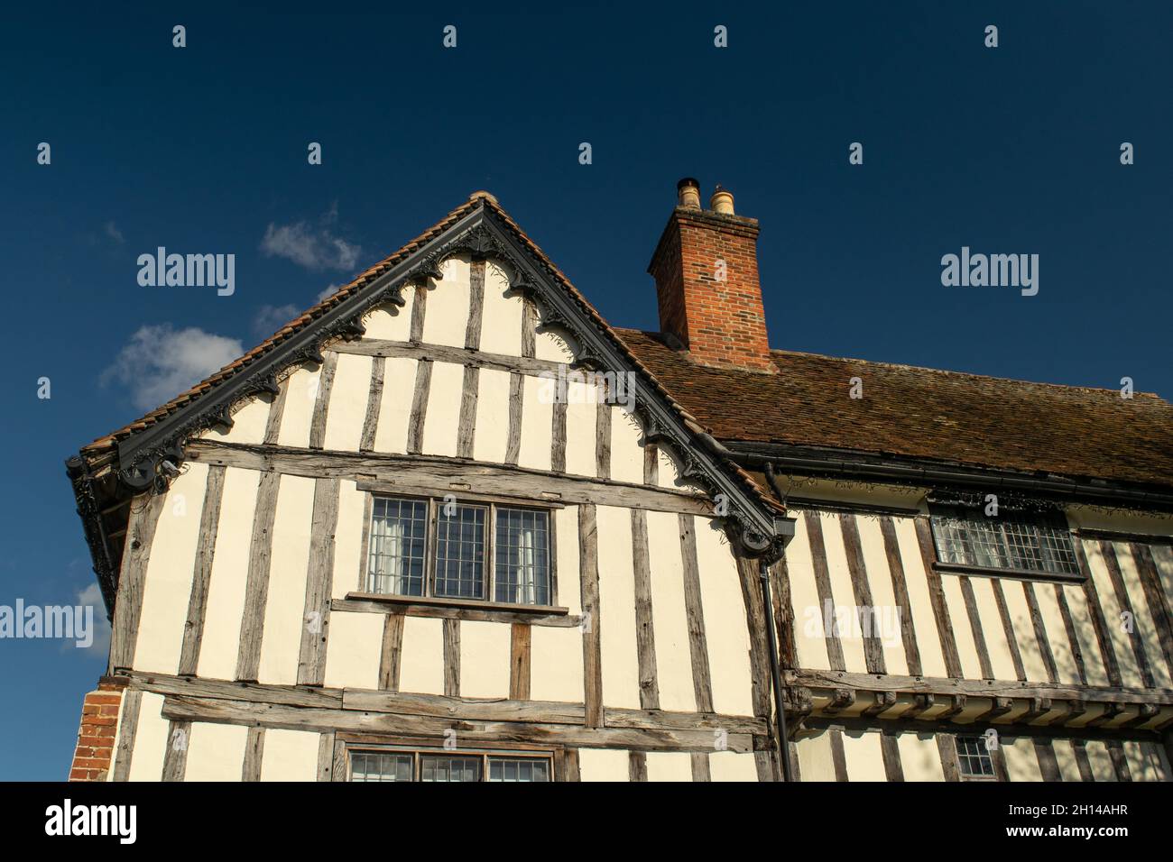 Facade of old Tudor timber framed cottage house at Saffron Walden ...