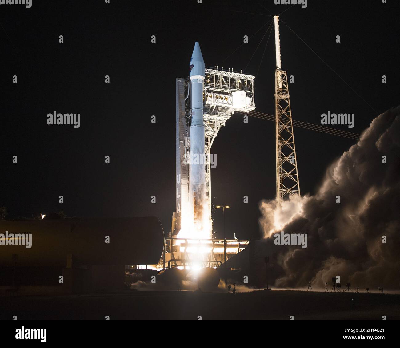 A United Launch Alliance (ULA) Atlas V rocket launches at 5:34 AM from ...