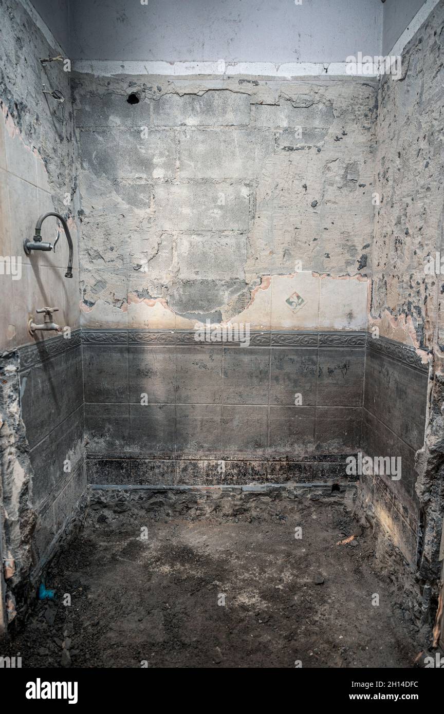 Dirty bathroom removal of tile with demolition and renovation Stock ...