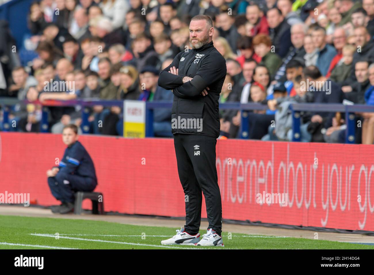 Wayne Rooney manager of Derby County watches the game from the ...