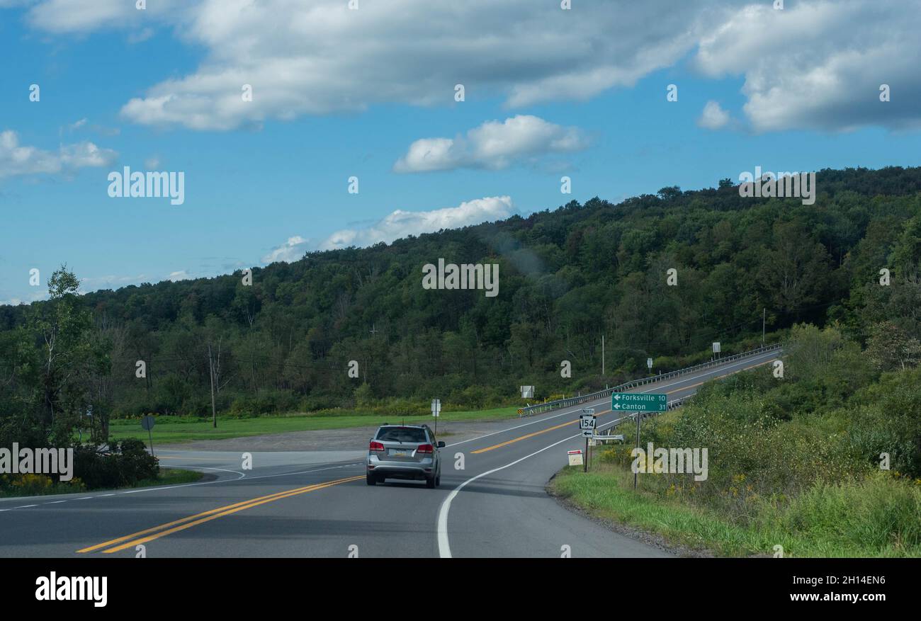 A view of a highway in rural America with cars traveling on it Stock ...