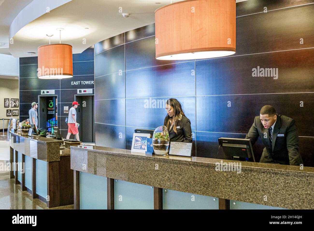 At a reception at the hilton hotel hi-res stock photography and images ...