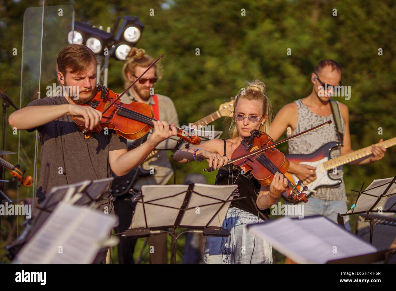 Woman with musical instrument hi-res stock photography and images - Alamy