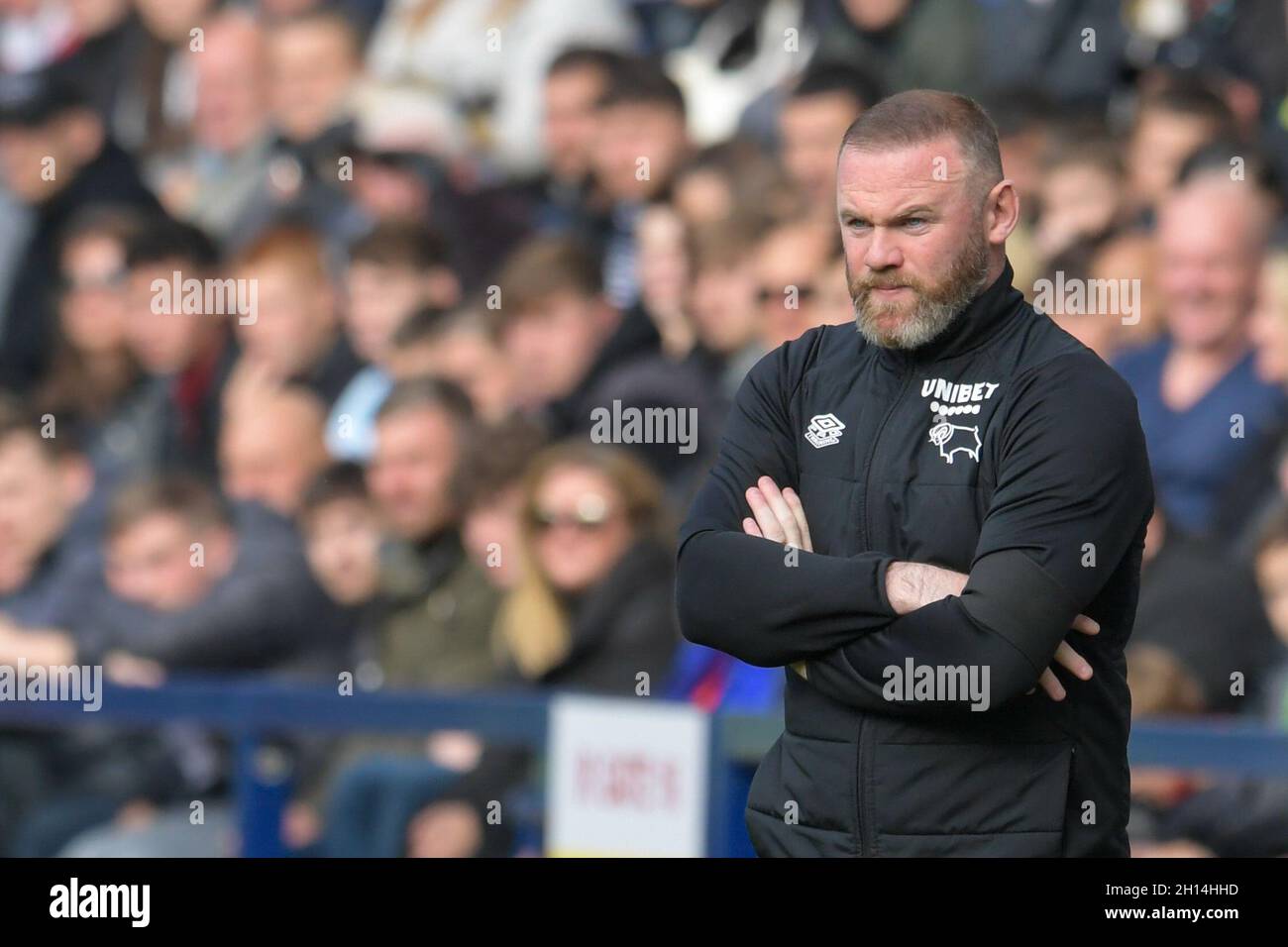 Wayne Rooney manager of Derby County watches the game from the ...
