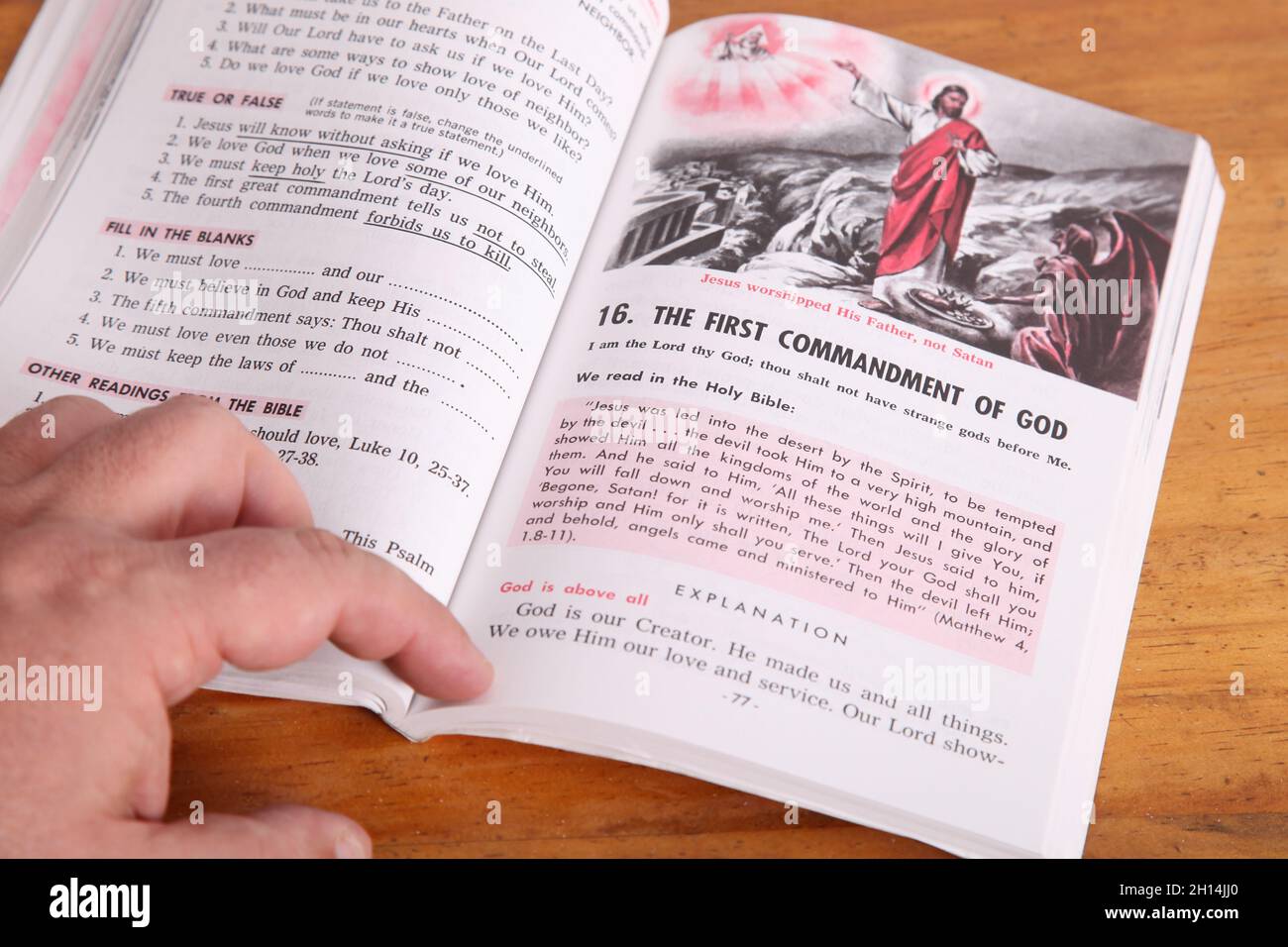 Man reading 'The First Commandment of God' Baltimore Catechism by ...