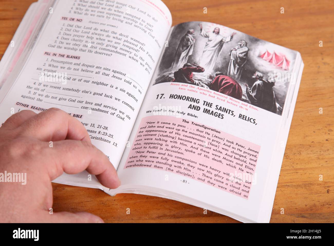 Man reading 'Honoring the Saints, Relics, and Images' Baltimore ...