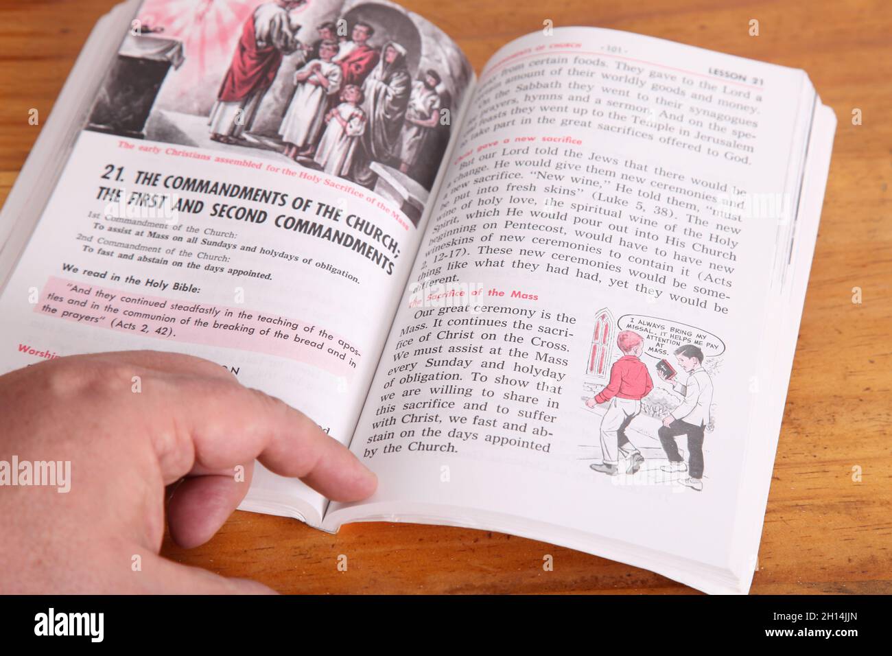 Man reading 'The Commandments of the Church The First and Second ...
