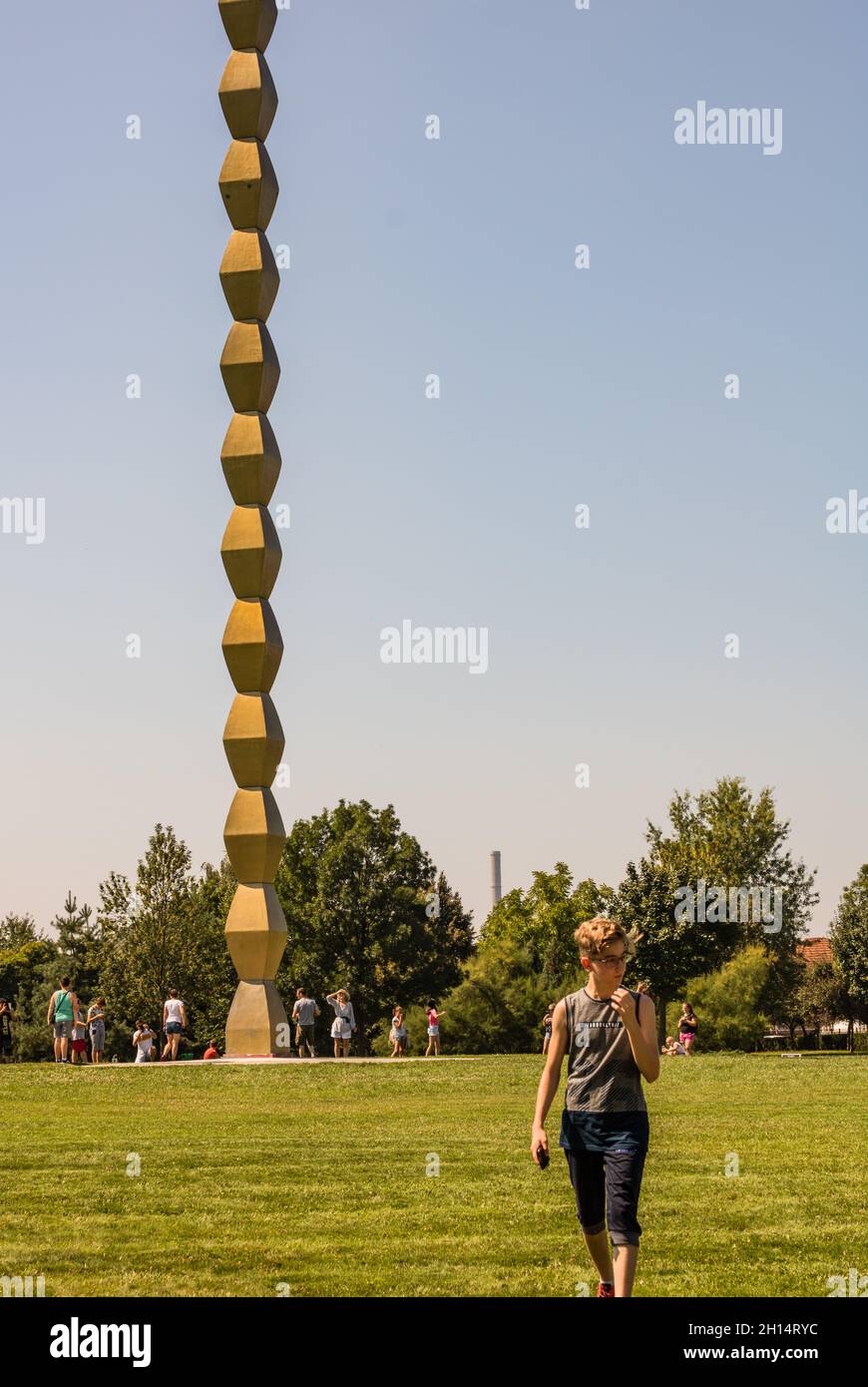 Kid in front of The Endless Column (Column of Infinite or Coloana ...