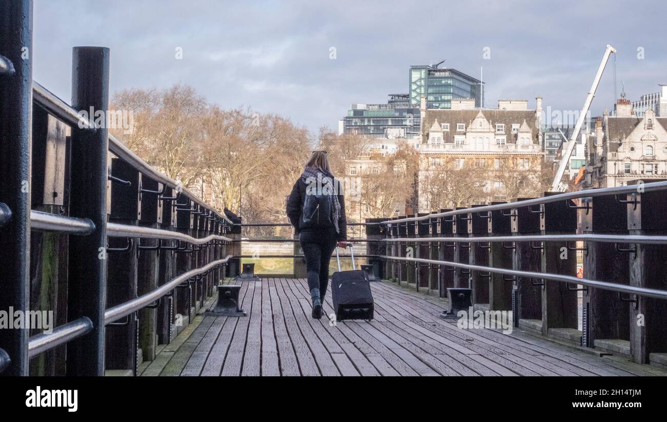woman walking along peer on the south bank London Stock Photo - Alamy