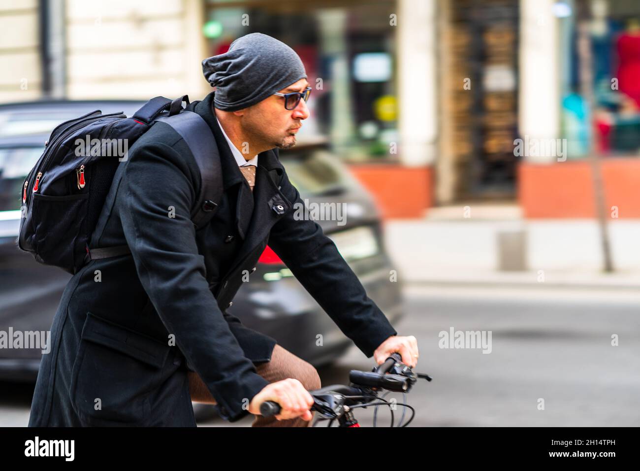 Riding a bike. Commuters on bike in Bucharest, Romania, 2021 Stock Photo - Alamy