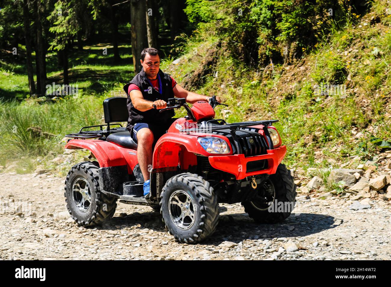 Iezer Mountains - Romania - 2019. Young people having a fun ride in the ...