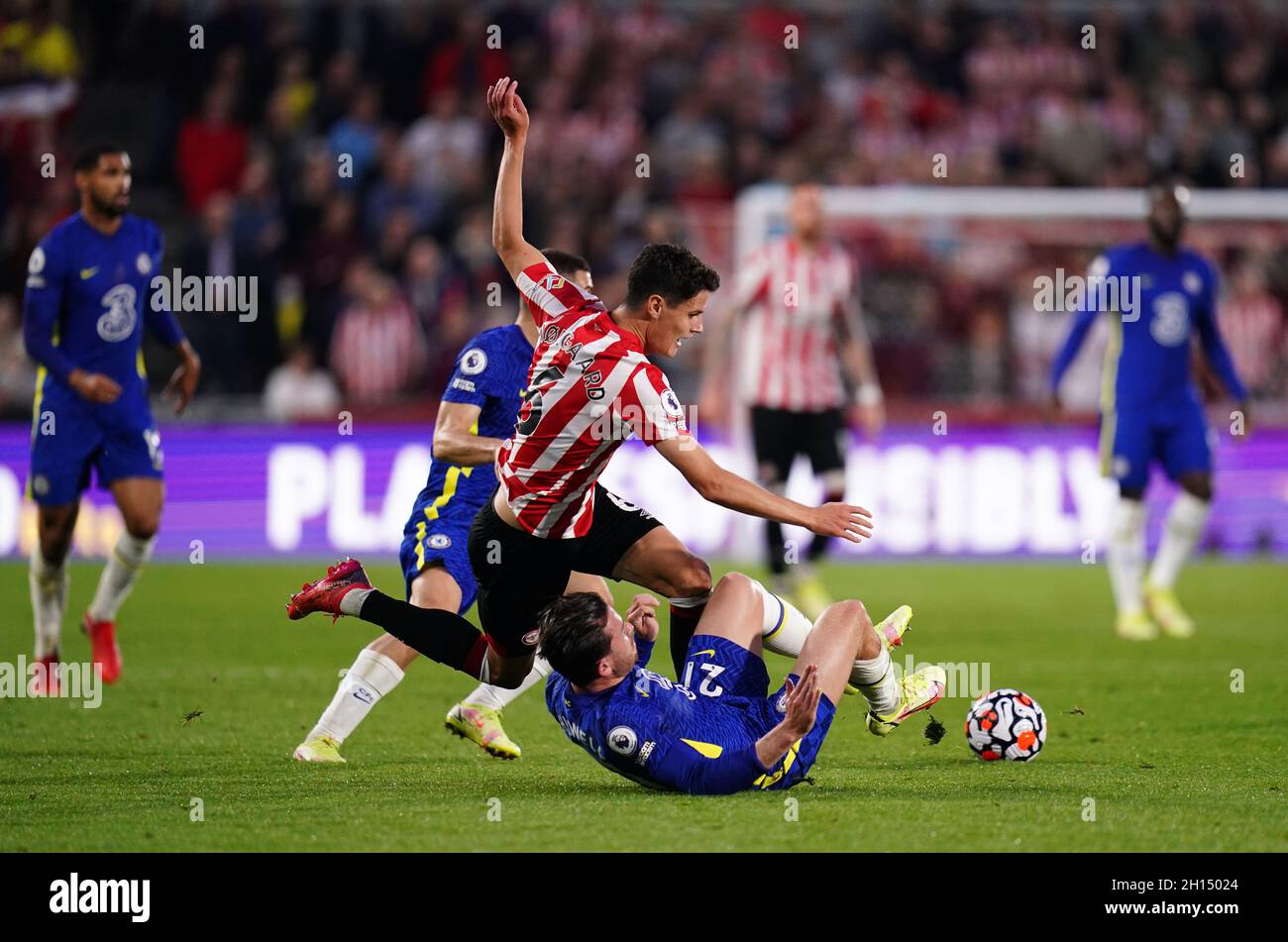 Brentford's Christian Norgaard (left) and Chelsea's Ben Chilwell battle ...