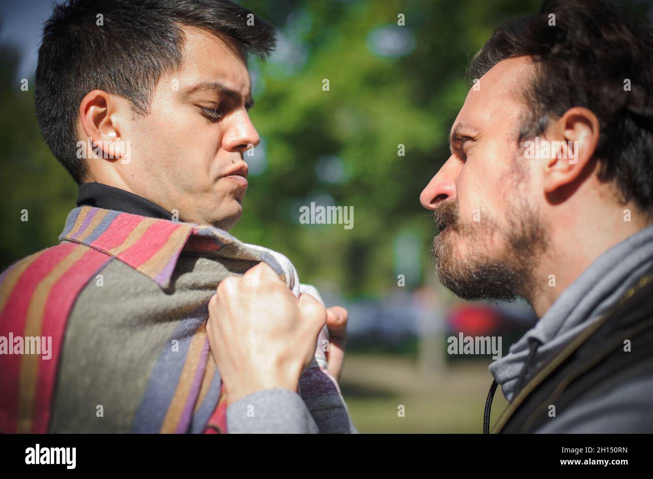 Two very angry, nervous and upset men in an aggressive and fierce ...