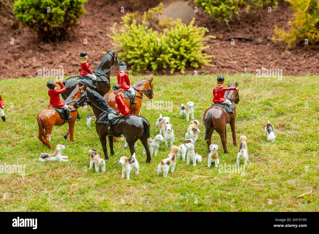 Closeup of tiny model fox hunters Stock Photo - Alamy