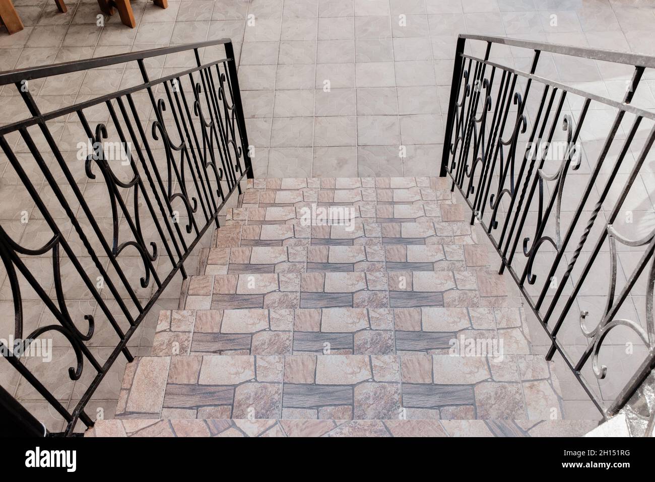 Stairs down walking style step forward go Stock Photo - Alamy