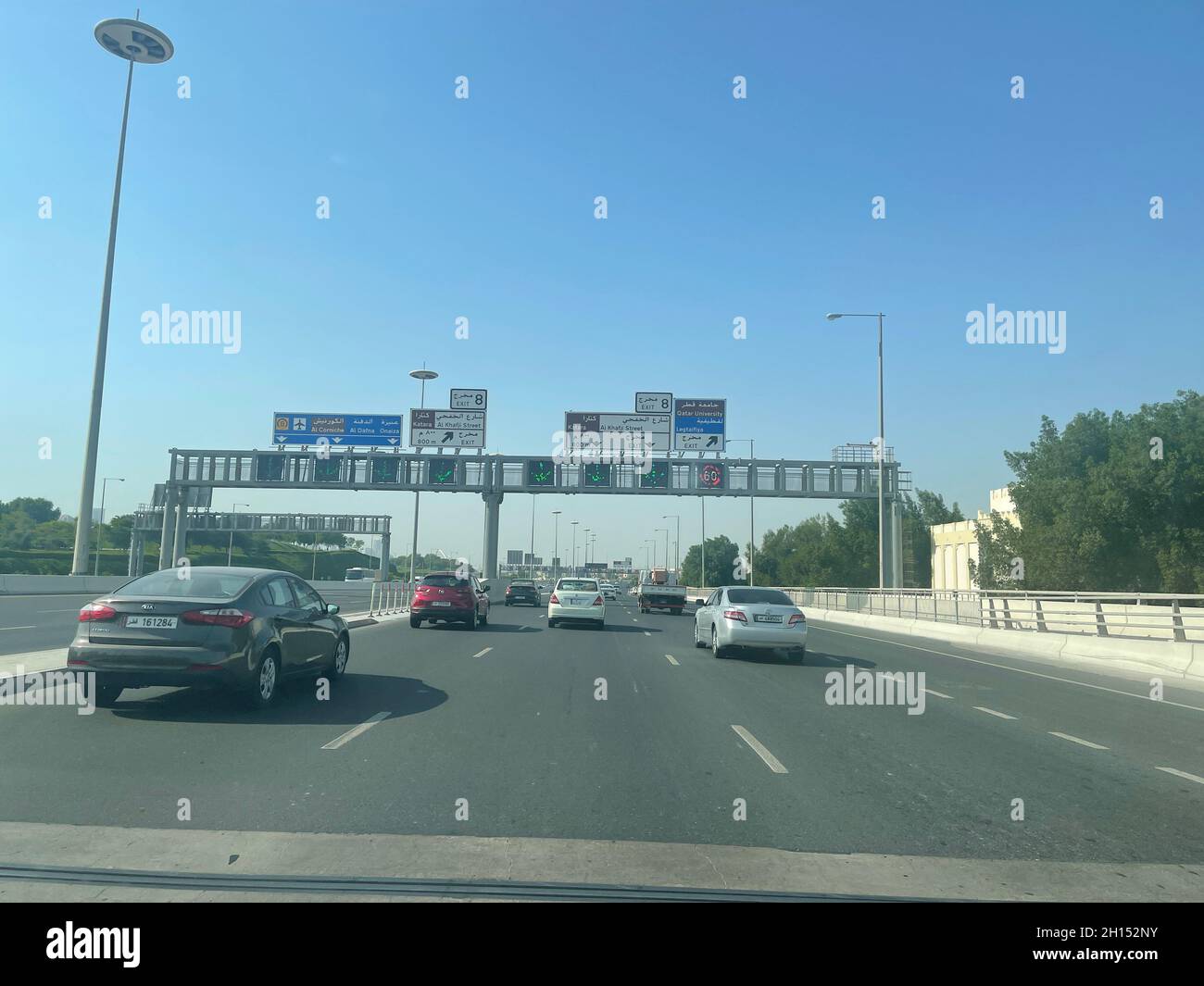 Road traffic at financial center in Doha - Lusail road with the Public ...