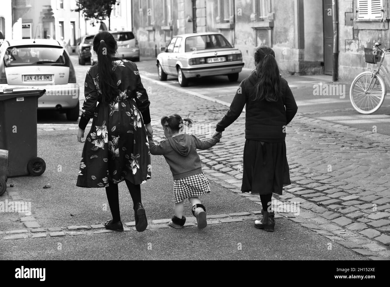 Holding street Black and White Stock Photos & Images - Alamy