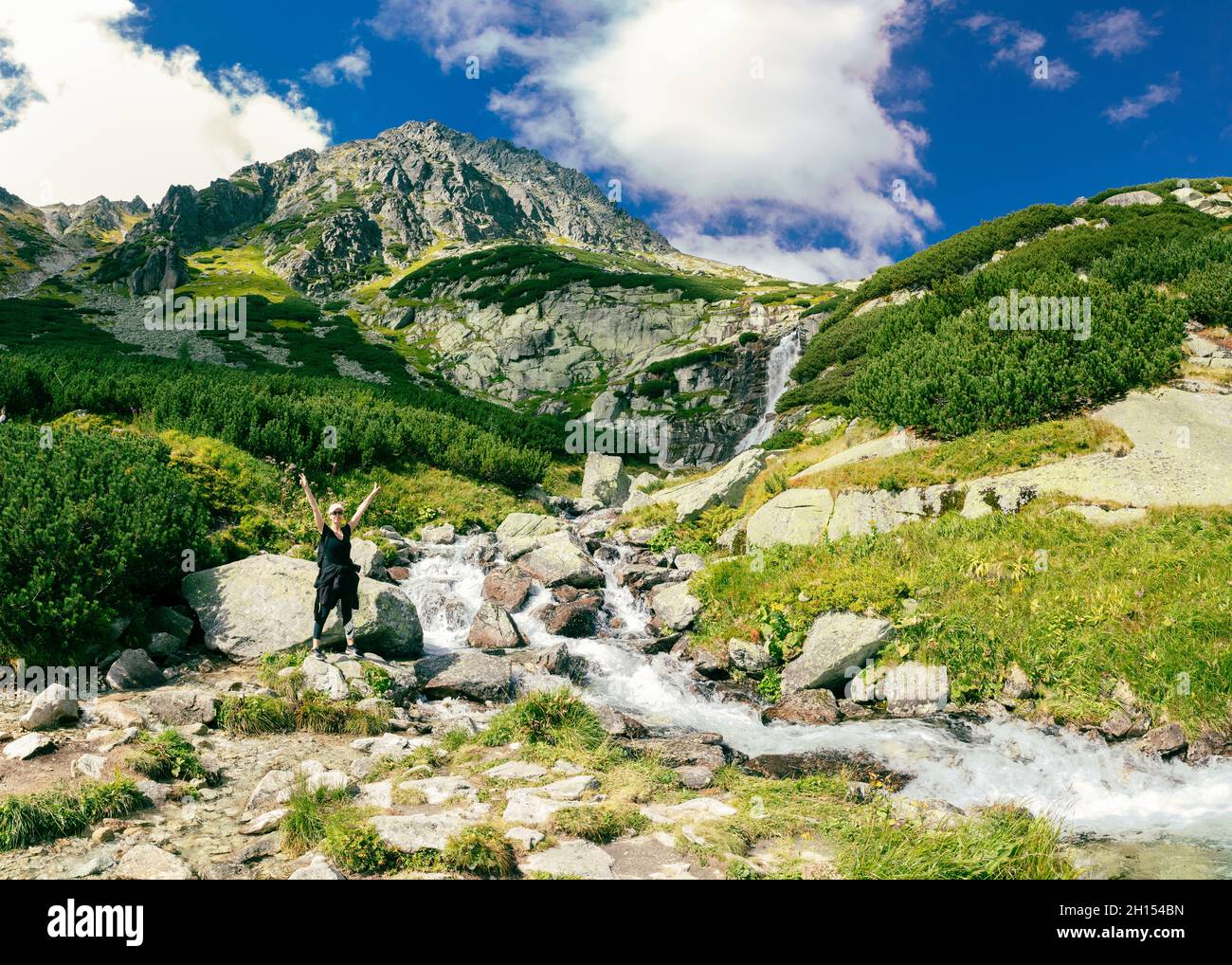 Panoramic view of Skok waterfall and the lake next to it in the western ...