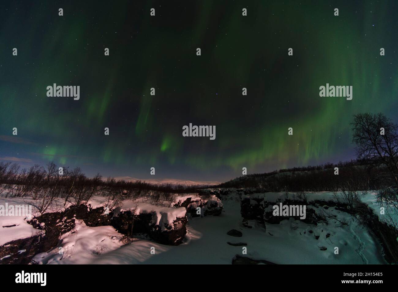 Scenic view of Aurora borealis, above Abisko National Park, Sweden ...