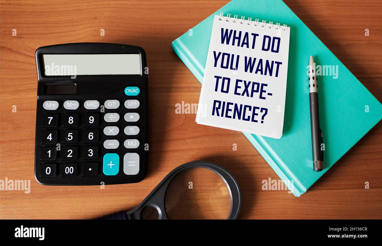 WHAT YOU WANT TO experience , text on notepad with stationery Stock ...