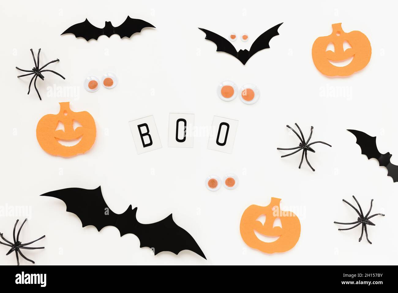 Pumpkins, spiders, bats and text BOO on white background. Halloween ...