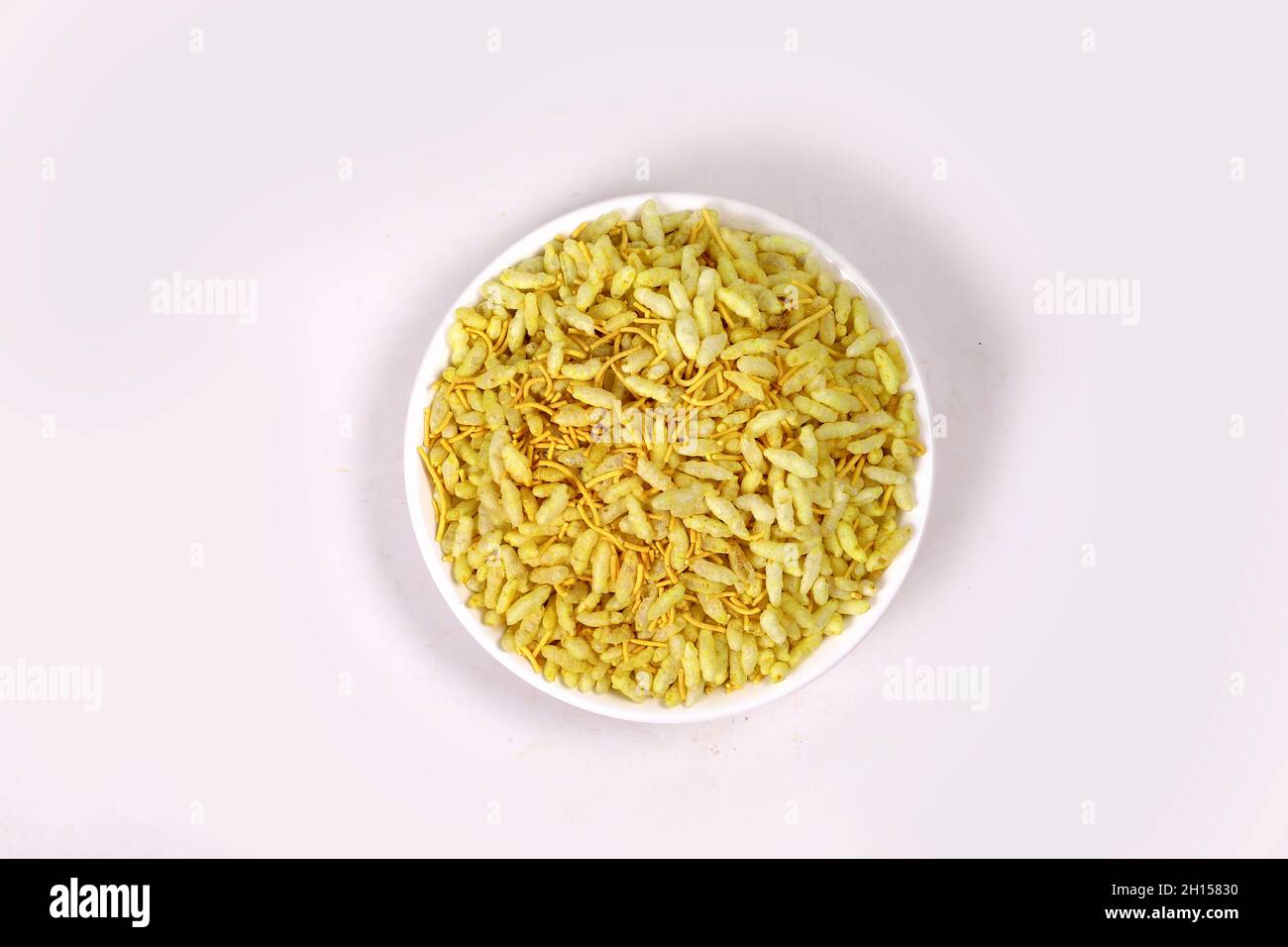 Sev Mamra is an Indian snack. It is a mixture of spicy dry ingredients ...
