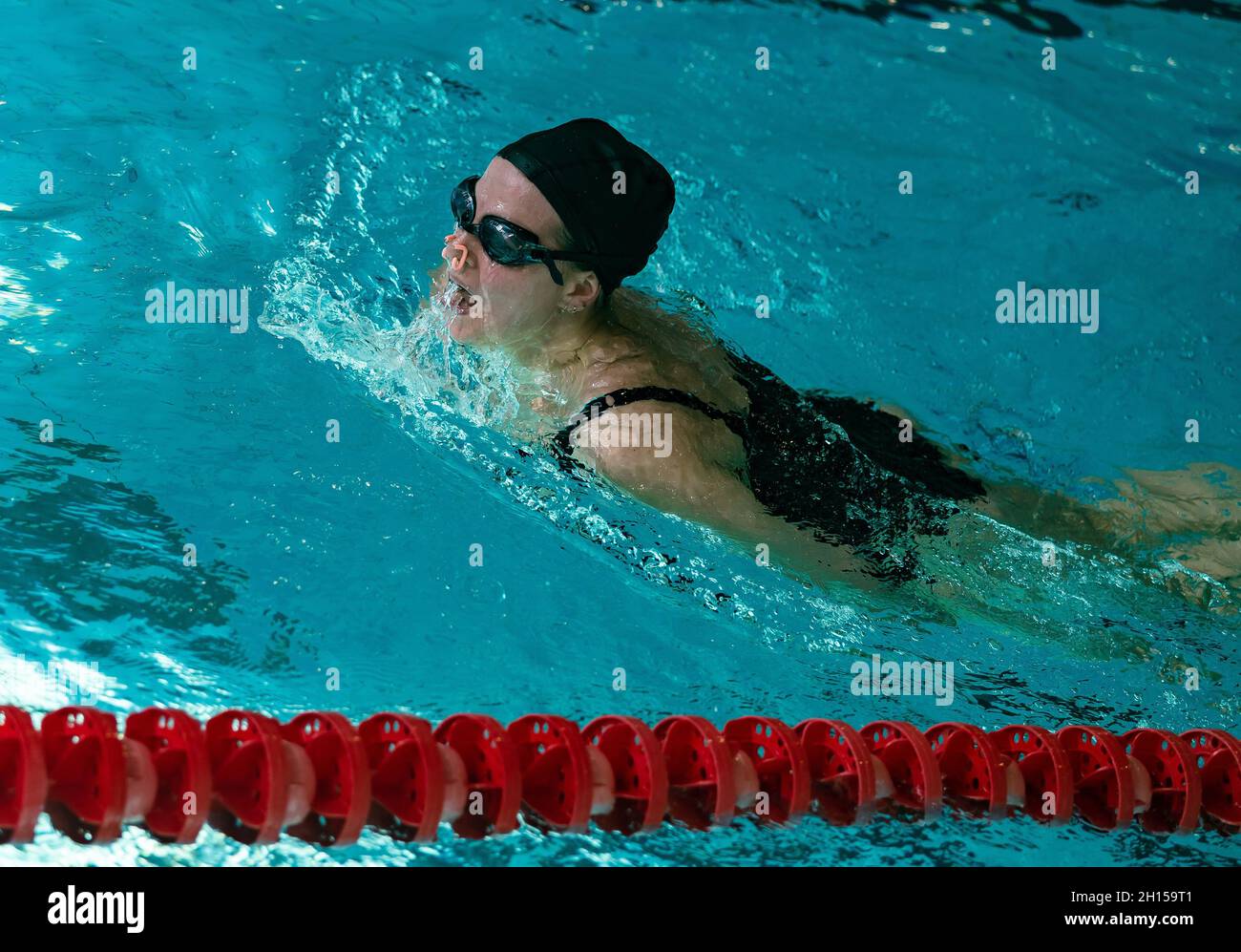 A swimmer is seen in action during the festival. The swimming pool of ...