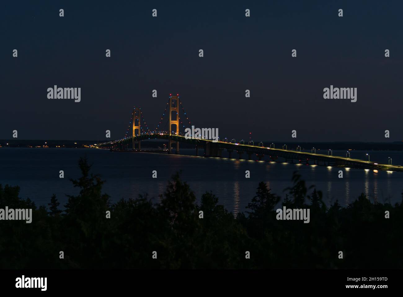 The Mackinaw Bridge after sunset from the Upper Peninsula Stock Photo ...