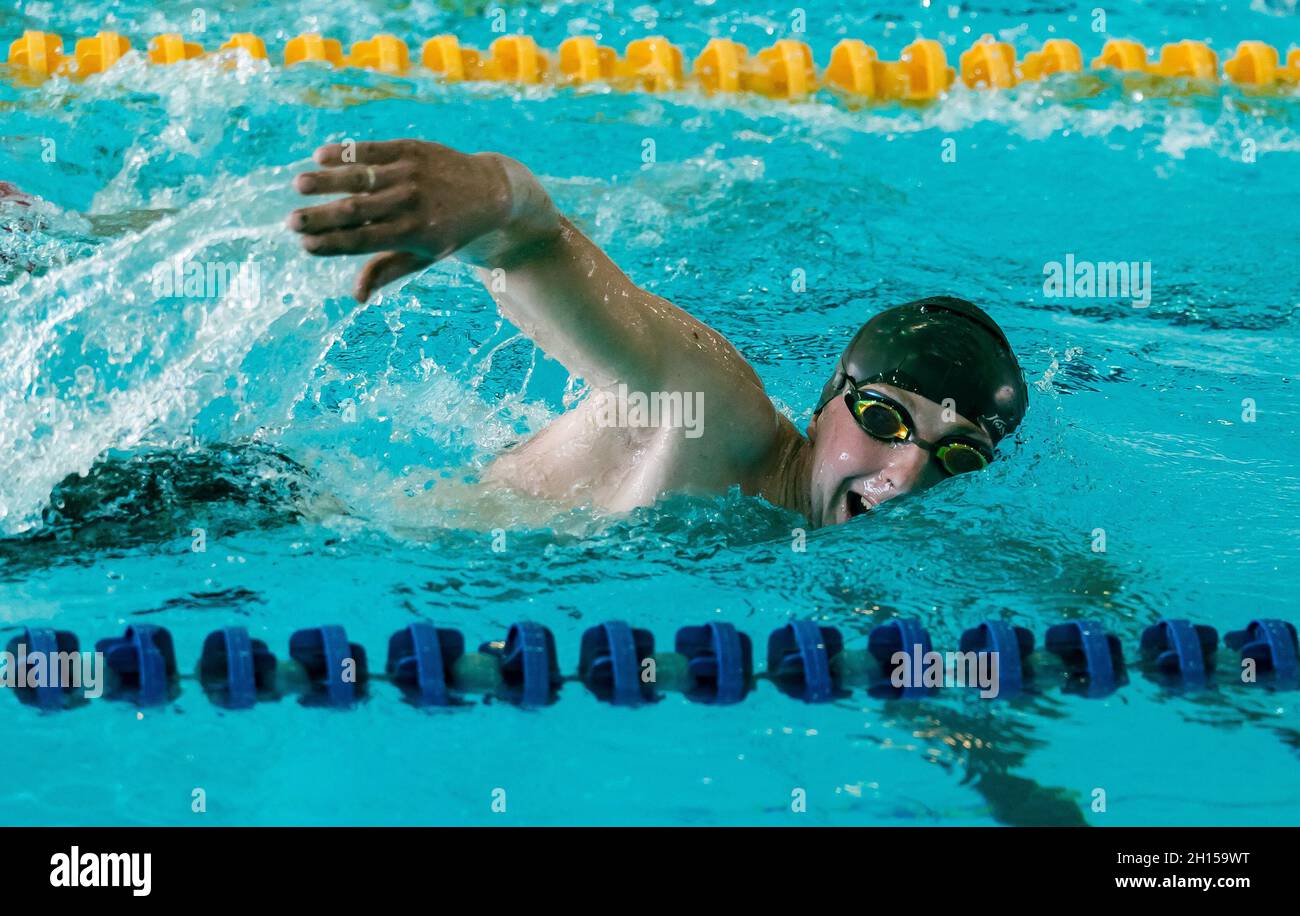 A swimmer is seen in action during the festival. The swimming pool of ...