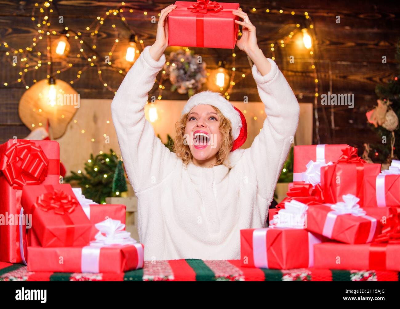 December happy moments. Festive mood. Beautiful wrapped gifts. Happy ...