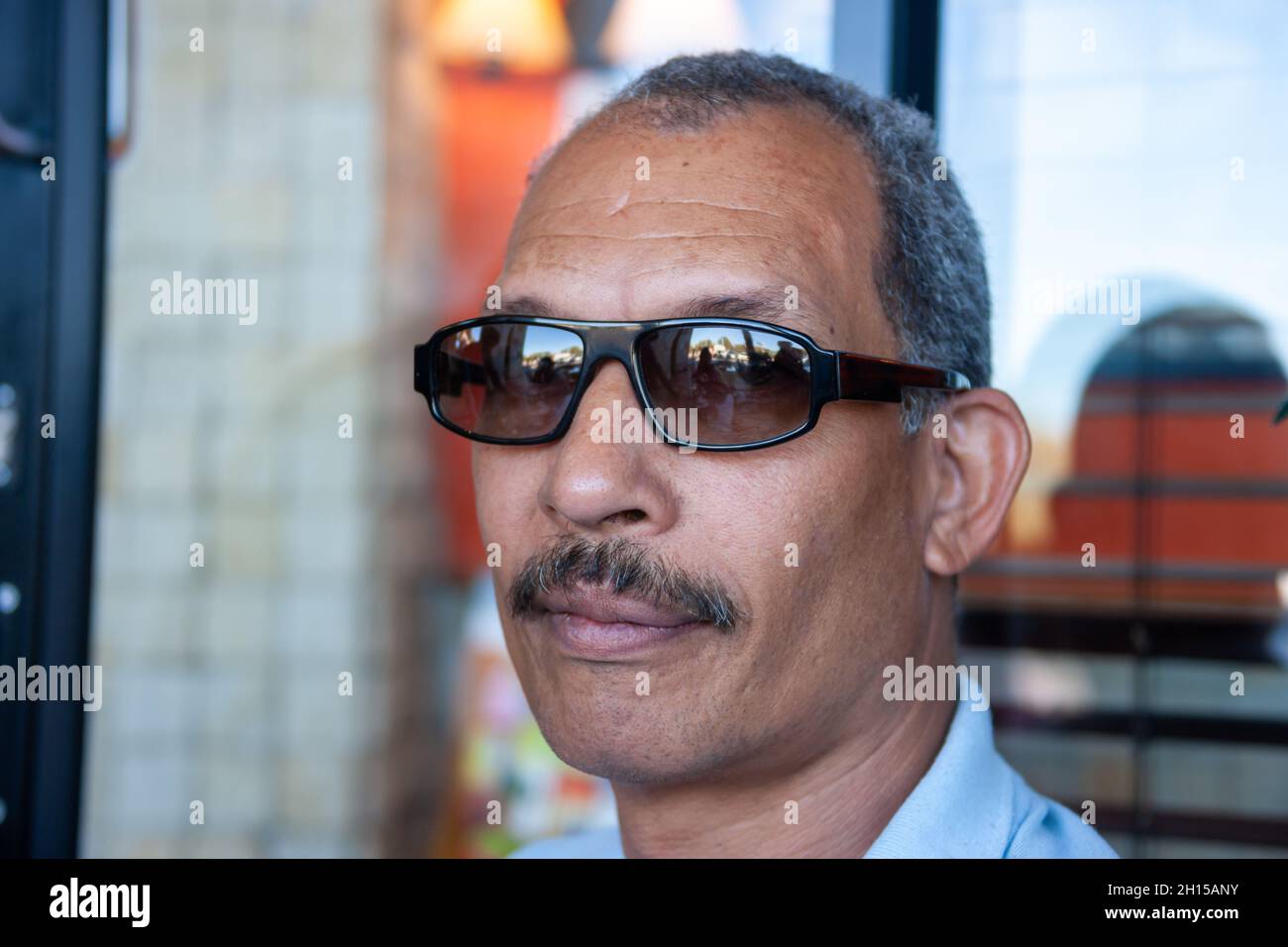 Relaxed latino cuban businessman in a coffeeshop in a mall Stock Photo ...