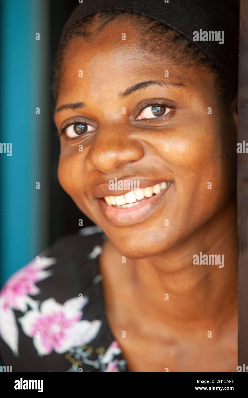 Young African Motswana woman, standing in the door step waiting Stock ...
